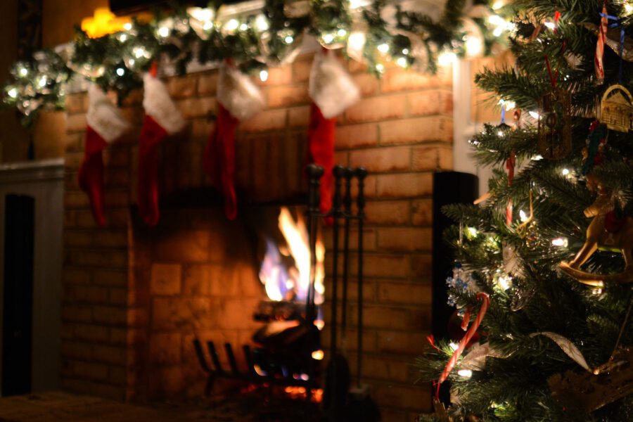 christmas-tree-in-front-of-a-fireplace-with-a-fire-2025-03-11-18-21-07 ...